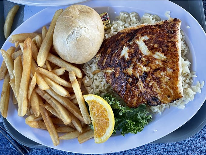 Grilled fish that looks like it's auditioning for a food magazine spread&mdash;simple, elegant, and proof that sometimes less is shore-ly more.