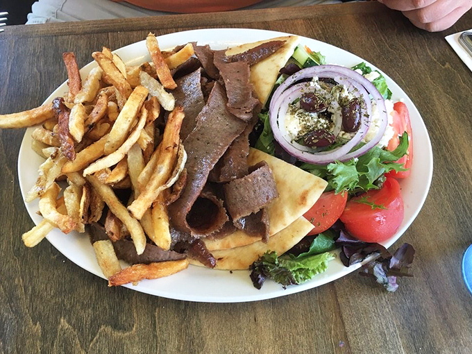 The gyro platter that transports you to the Mediterranean without the airfare&mdash;tender meat, fresh vegetables, and fries that refuse to be mere sidekicks.