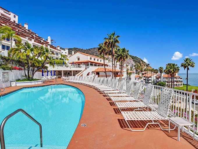 Pool chairs await at Hamilton Cove, where the hardest decision of the day is whether to swim in chlorine or salt water.