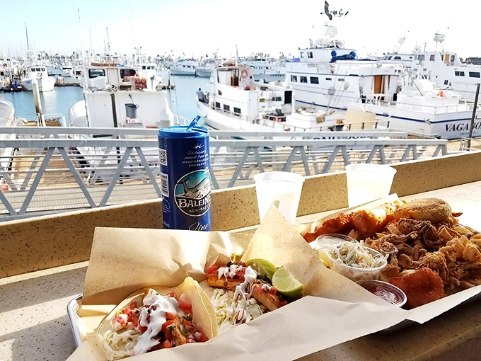 The view that comes with lunch: fishing boats bobbing in their slips while you contemplate a second beer and another fish taco.