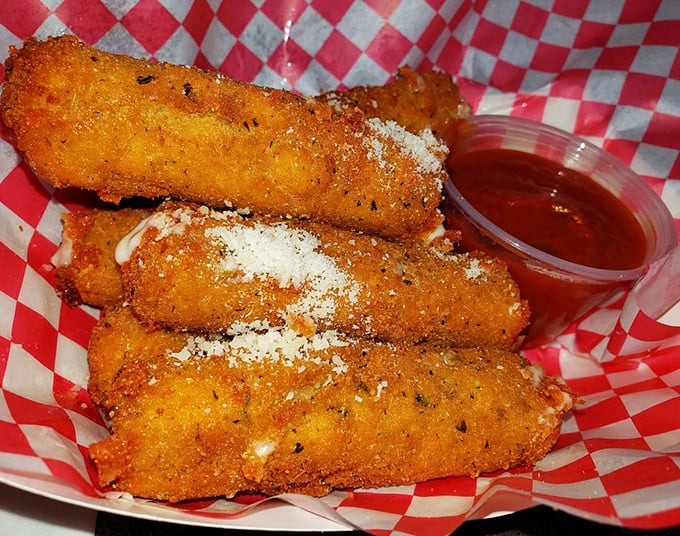 These aren't your average mozzarella sticks—they're golden-brown masterpieces that stretch dramatically with each pull. The marinara dipping sauce seals the deal.