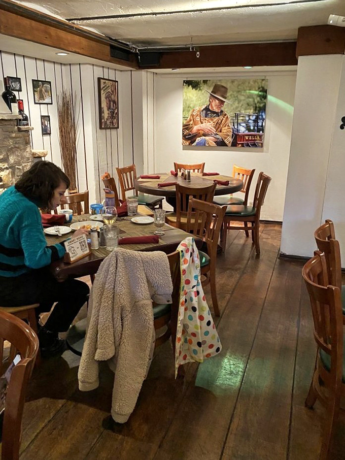 Cozy corners and wooden charm create intimate dining spaces where memories are made between bites of exceptional food.