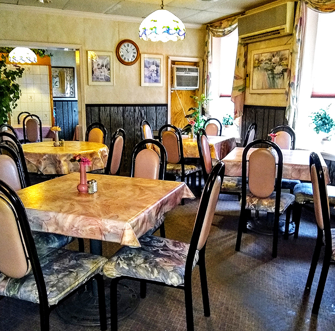 Simple tables, simple chairs, extraordinary food. The dining room's modest appearance is the ultimate culinary misdirection.