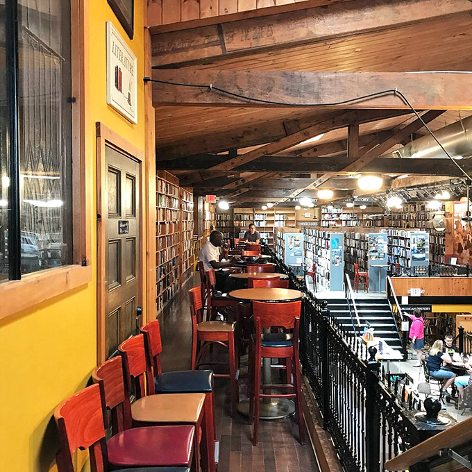 The balcony seating offers the perfect perch for people-watching, coffee-sipping, and pretending you're in a Parisian literary café.