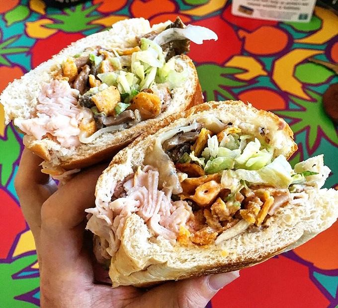 The Jack Del Rio sandwich: layers of turkey, roast beef, and honey BBQ Fritos creating textural perfection.