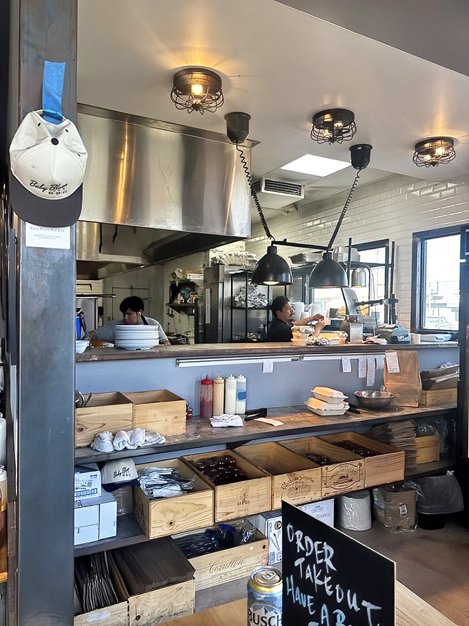 Wooden wine crates repurposed as storage bins – because great barbecue, like great wine, deserves respect for tradition.
