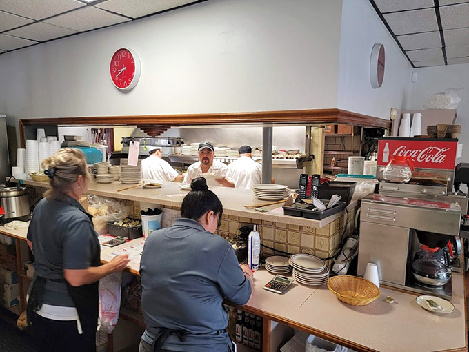The kitchen pass&mdash;that sacred portal where plates transform from mere orders into moments of joy for waiting customers.
