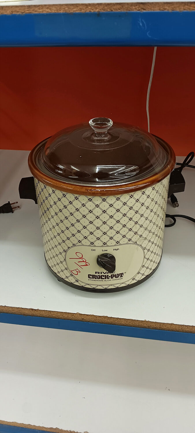 That vintage Crock-Pot has probably slow-cooked enough chili to feed a small country and stands ready for its second act in someone's kitchen.