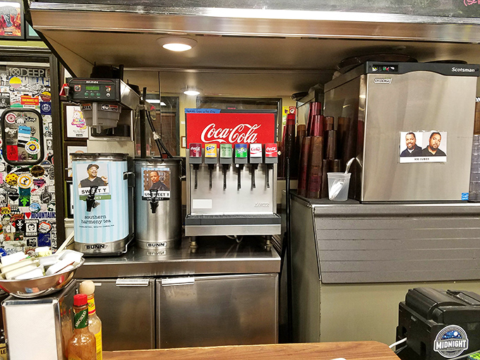 A soda fountain that takes you back to simpler times. That classic Coca-Cola machine stands ready to provide the perfect complement to your comfort food feast.