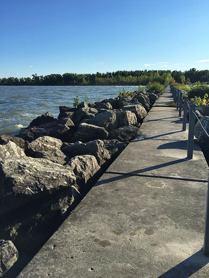Lake Erie's breakwall path invites contemplative walks where the only decision is whether to look at the water or the sky.