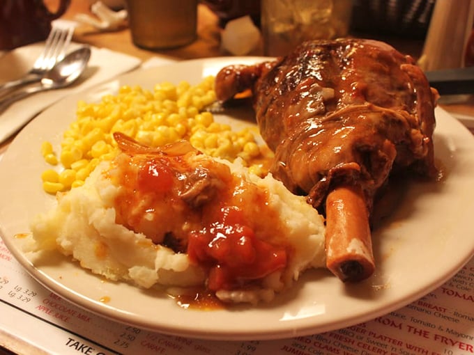 This lamb shank isn't just falling off the bone&mdash;it's practically filing for independence. Comfort food that makes you want to hug the chef. 