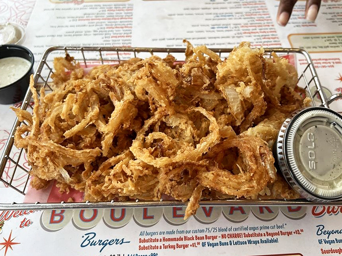 Onion strings so perfectly golden and crispy, they deserve their own fan club. These aren't sides—they're the main event's worthy co-star.
