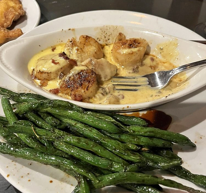 Lemon butter scallops that glisten like culinary jewels, tender and bursting with coastal flavors.