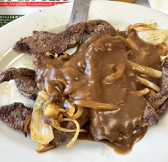 Country-fried steak smothered in gravy isn't just comfort food&mdash;it's edible therapy that makes Monday mornings bearable again.