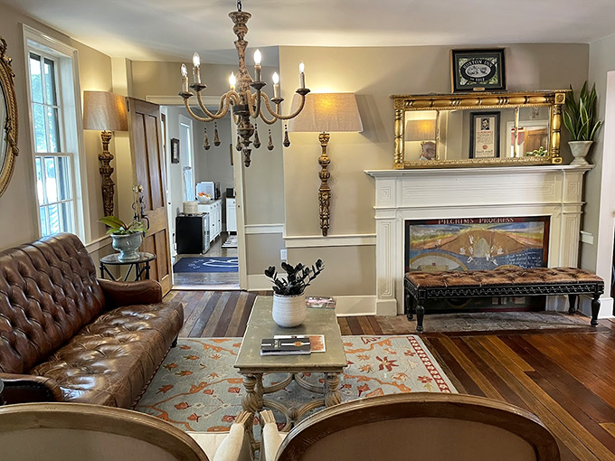 Cozy living spaces maintain authentic 19th-century charm while providing comfortable gathering spots for modern guests.