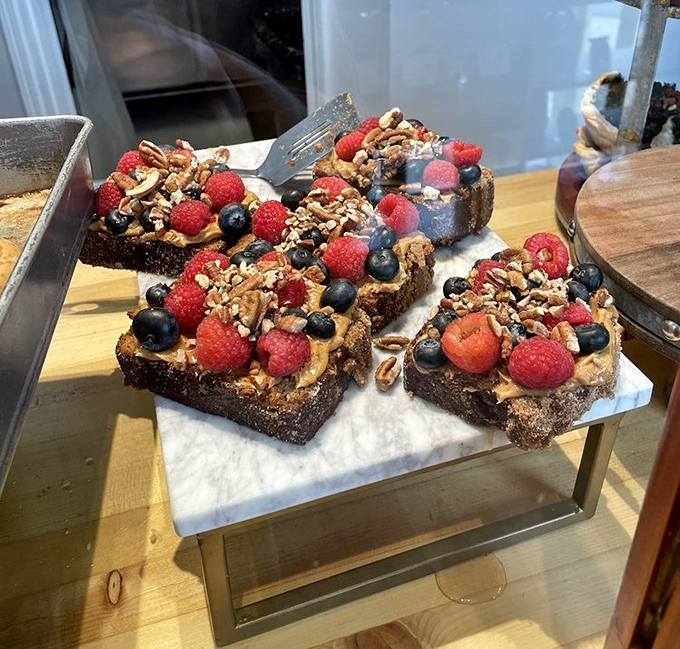 Banana bread gets the royal treatment with fresh berries and nuts&mdash;like breakfast and dessert had a beautiful baby.