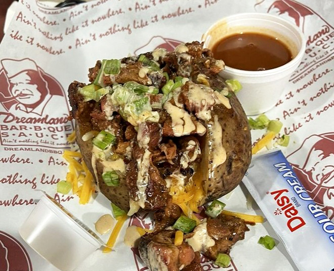 A loaded potato that's dressed for success with all the BBQ fixings. This spud didn't just graduate from side dish academy—it's teaching the master class.
