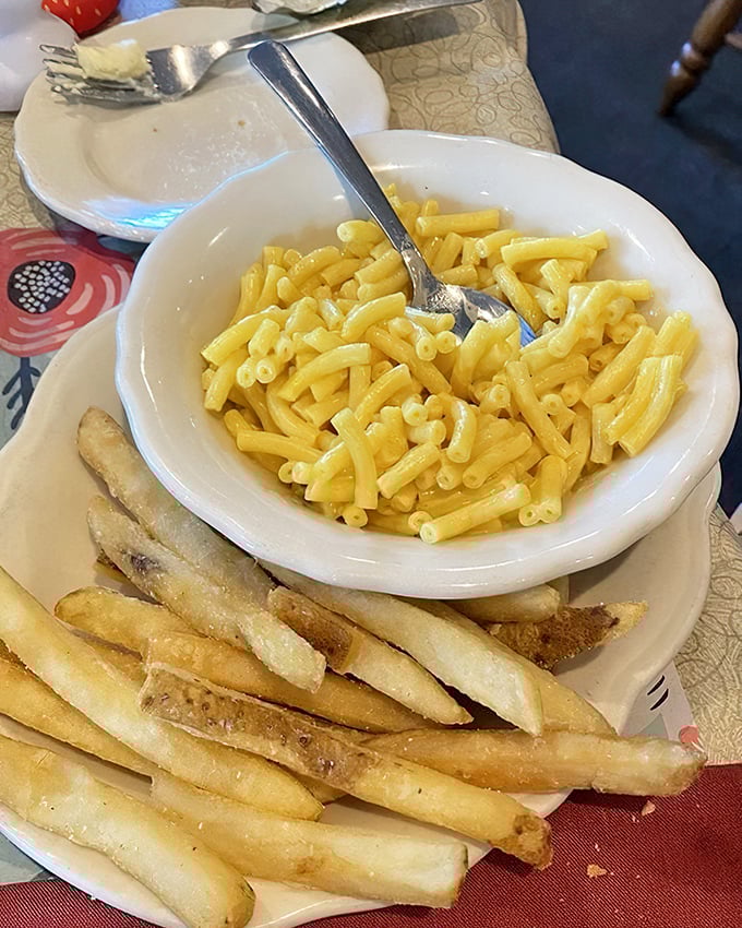 Mac and cheese with golden fries—because sometimes your inner eight-year-old deserves a seat at the grown-up table too.