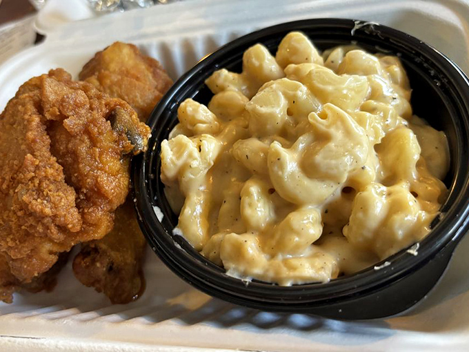 Mac and cheese that doesn't apologize for being comfort food sits proudly next to chicken that's been introduced to hot oil with expert timing.