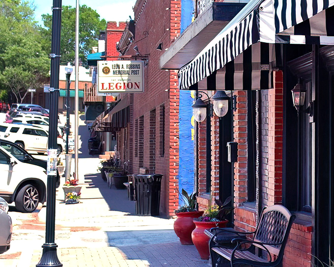 Main Street's businesses huddle together like old friends sharing stories, each brick facade holding decades of local gossip and community milestones.