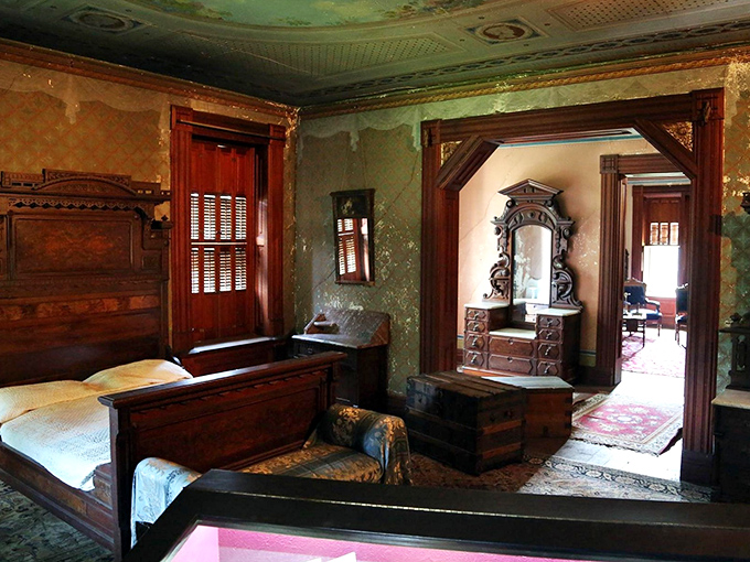 The master bedroom where dreams were had in grand style. That ornate bed frame probably weighs more than my car.