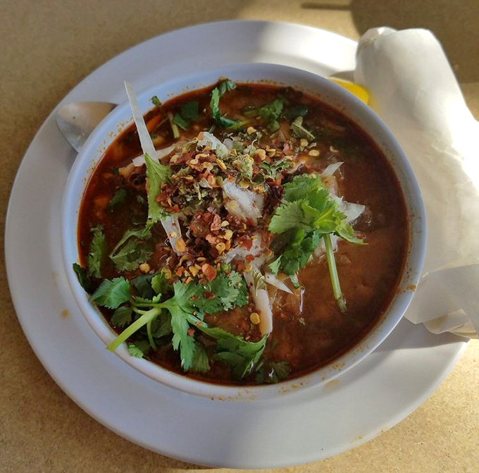 Menudo done right - a weekend tradition that brings comfort and community to every spoonful.