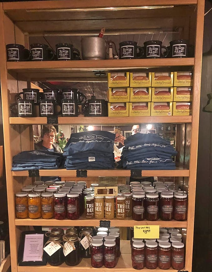 The ultimate souvenir shelf&mdash;branded mugs, homemade preserves, and t-shirts. Because the best vacation memories should be both wearable and edible.