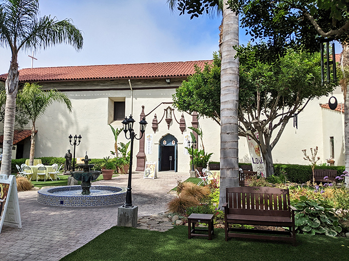 The Mission Basilica's serene courtyard offers a moment of historical reflection&mdash;spiritual wealth that doesn't require actual wealth to experience.
