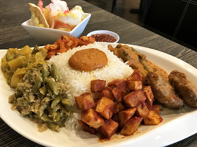 The Indonesian mixed plate &ndash; a greatest hits album for your taste buds. Each component tells its own delicious story while creating a harmonious culinary concert.