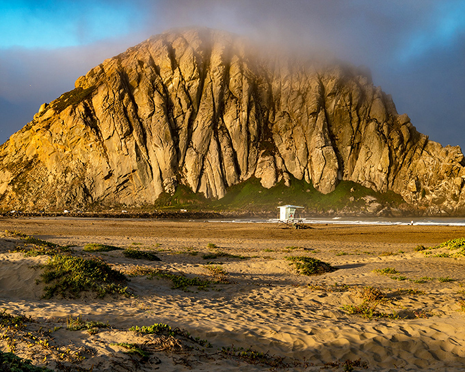When the marine layer kisses Morro Rock at sunset, it creates the kind of moment that makes amateur photographers look like professionals.