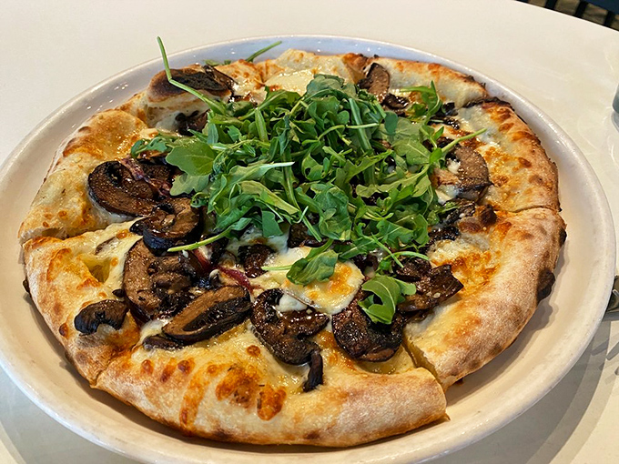 This isn't just a mushroom pizza&mdash;it's a fungi festival with a crispy, blistered crust that makes you want to high-five the pizza maker.