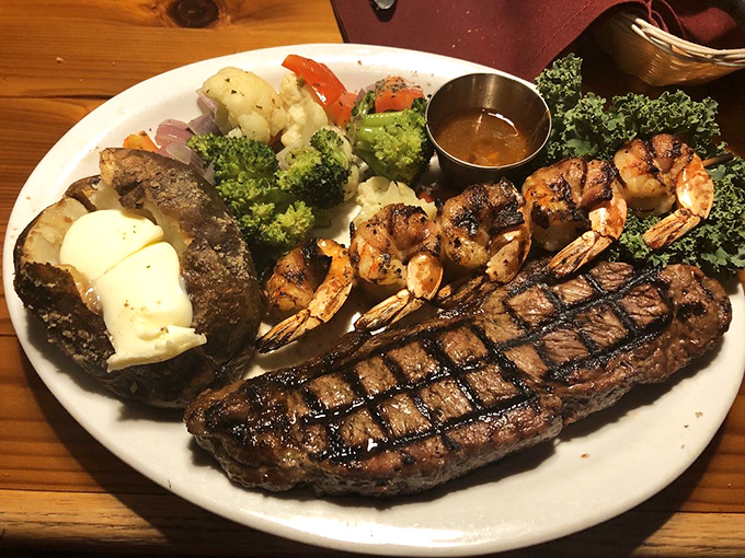 The surf and turf platter that answers the eternal question: "Why choose between steak and seafood when you can have both?" Those grill marks tell no lies.