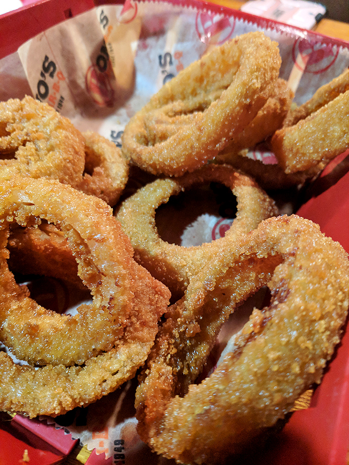 Onion rings with the perfect crunch-to-give ratio &ndash; like edible golden halos that angels would fight over.