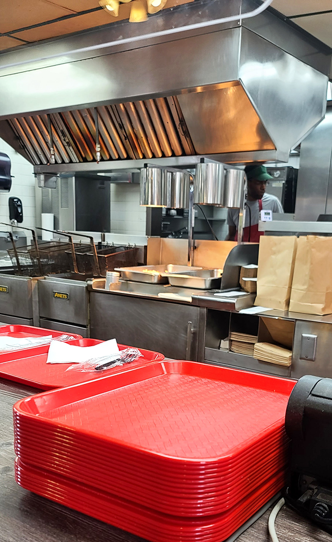 A glimpse behind the curtain. The kitchen at Benjamin's isn't hiding anything&mdash;just honest cooking with equipment that's earned its patina.