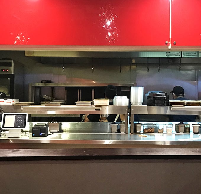 The open kitchen concept: dinner and a show, where the drama is "Will that burger be as amazing as it smells?"