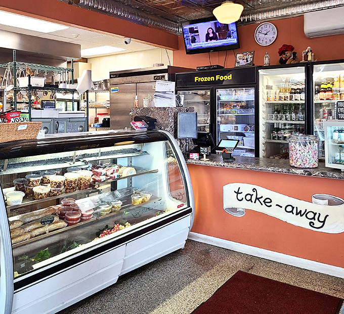 The take-away counter showcases desserts that make willpower crumble faster than their cannoli shells. Resistance is futile, and honestly, why bother?