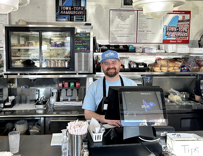Behind every great burger joint is a counter person with a smile, ready to turn your hunger into happiness one order at a time.