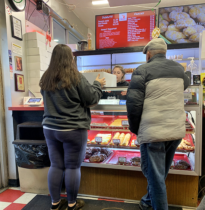The sacred exchange of donuts for currency &ndash; a transaction as old as time and twice as satisfying.