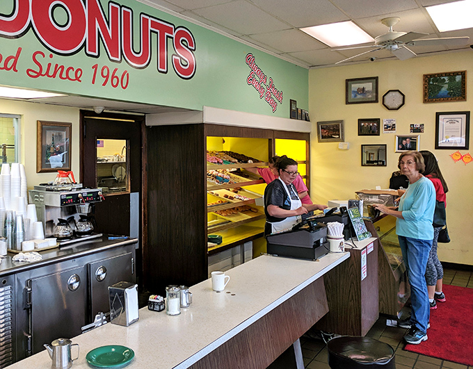 The moment of truth at the counter. That look of anticipation as your donut dreams are about to become reality is universal &ndash; somewhere between Christmas morning and winning the lottery.
