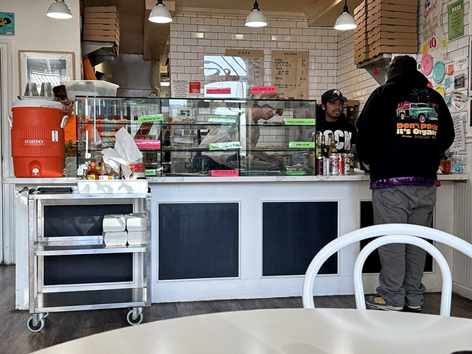 The counter where pizza dreams come true&mdash;simple, efficient, and focused on the craft. No pretension, just pizza perfection waiting to happen. 