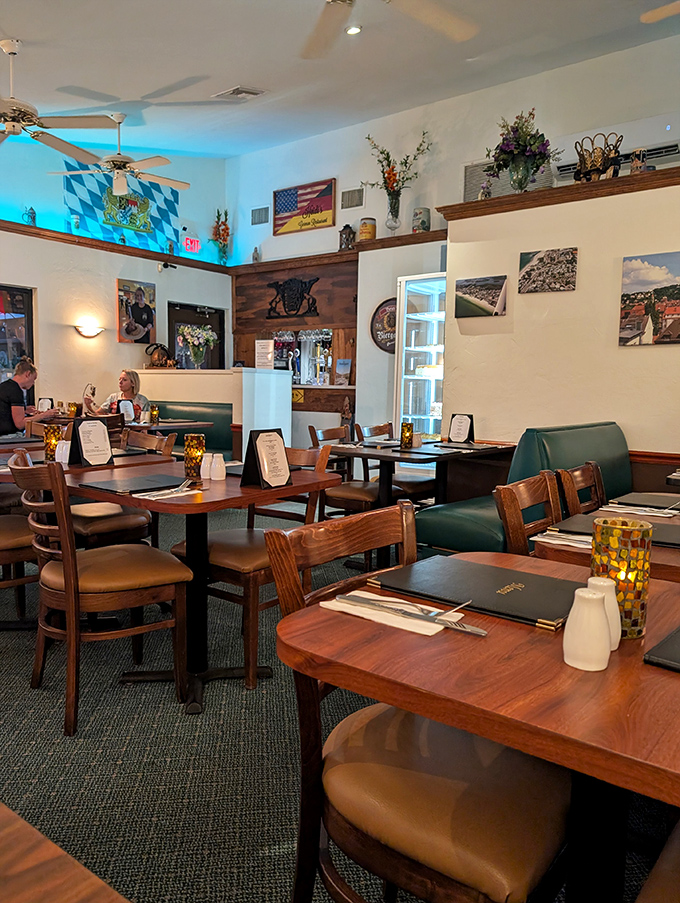 The Bavarian flag and cozy booths create that perfect "Gem&uuml;tlichkeit"&mdash;that untranslatable German coziness that makes you want to stay forever.