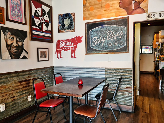 Red chairs pop against corrugated metal wainscoting&mdash;a visual reminder that this place marches to its own deliciously smoky drummer.