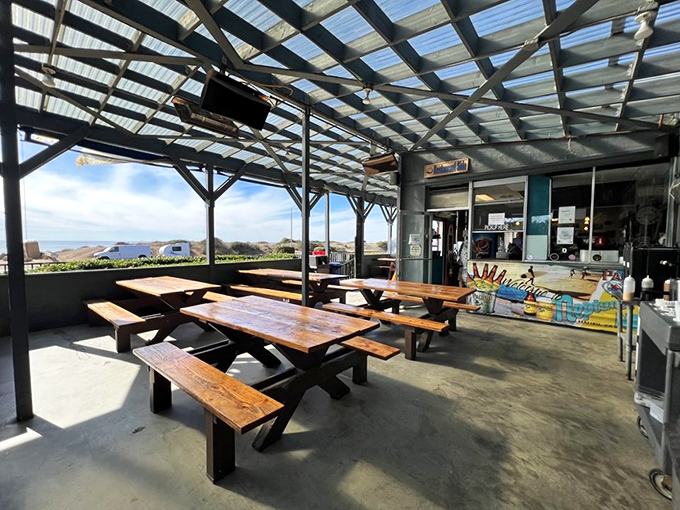 Rustic picnic tables with million-dollar views – the kind of outdoor dining that makes fancy restaurants seem pointless.
