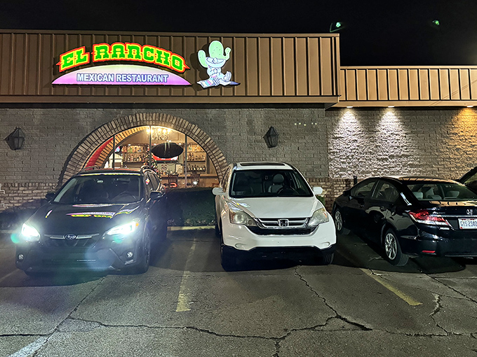 By night, the glowing sign beckons hungry travelers like a lighthouse for those lost in a sea of chain restaurants.