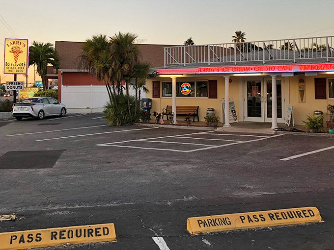 The sunset casts a golden glow on Larry's, as if nature itself is highlighting tonight's dessert destination.