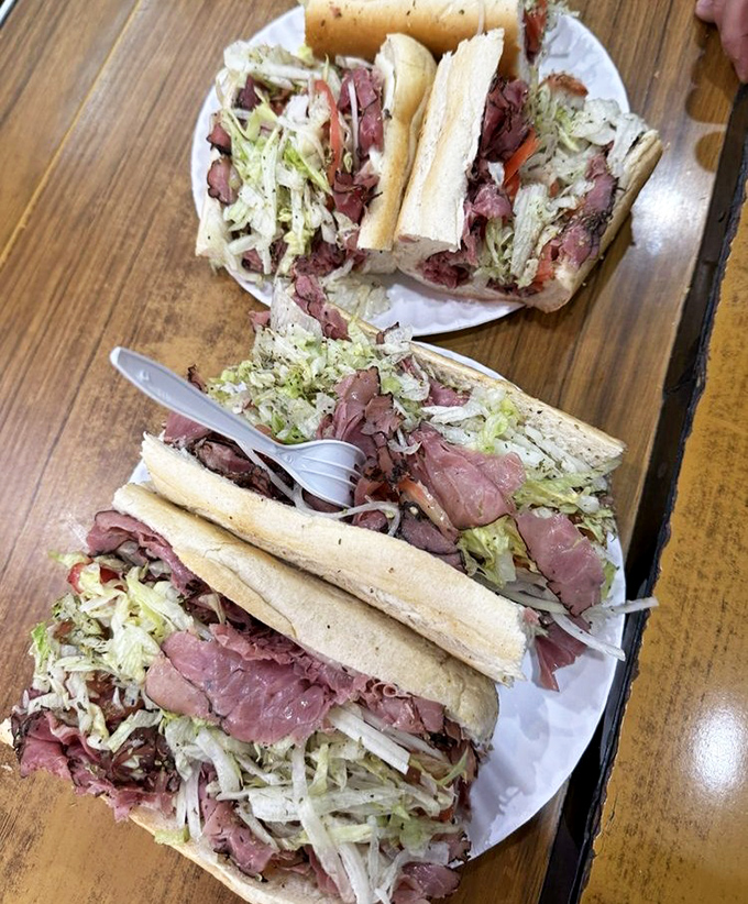 The pastrami battleship isn't just a sandwich&mdash;it's an edible monument to excess that makes Manhattan delis tip their hats in respectful acknowledgment.