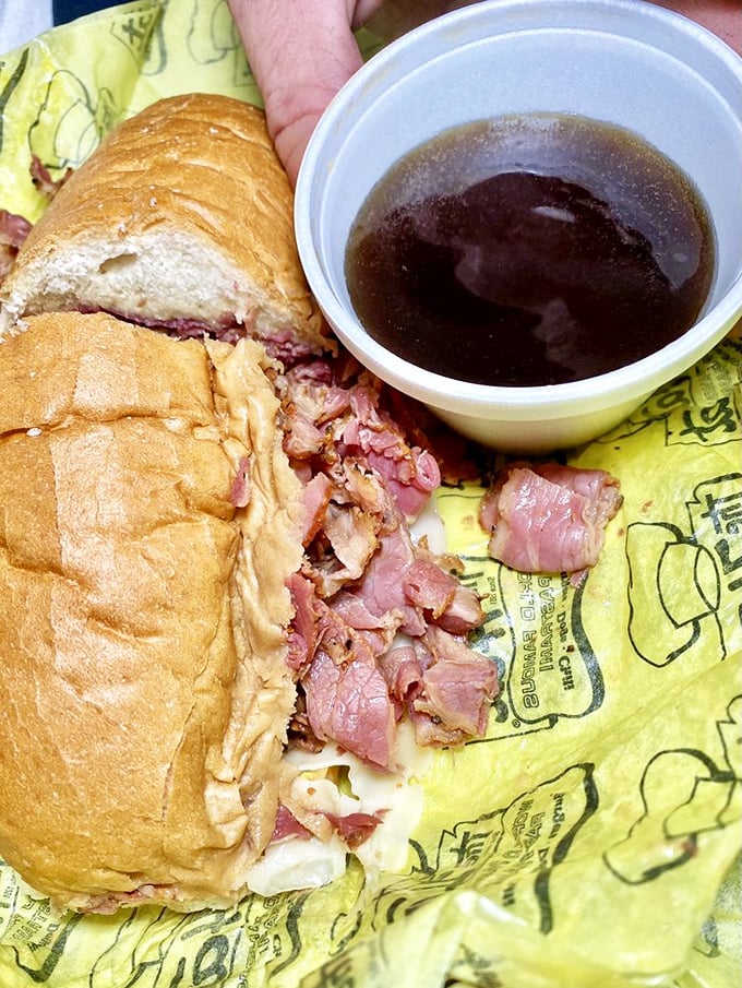 The Pastrami Dip with its cup of savory jus&mdash;a sandwich so good it deserves its own dipping pool.