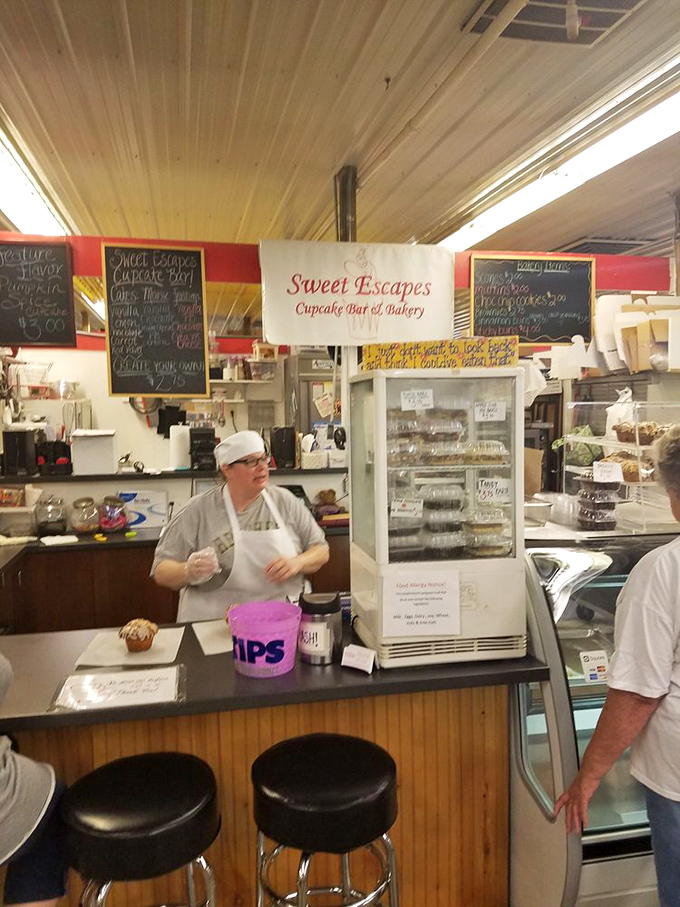 Sweet Escapes indeed! This bakery counter proves that happiness is just a homemade cupcake away.