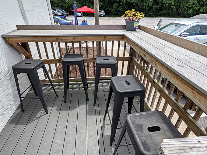 The deck seating offers fresh air to complement your fresh meat. Those stools have heard many satisfied sighs.