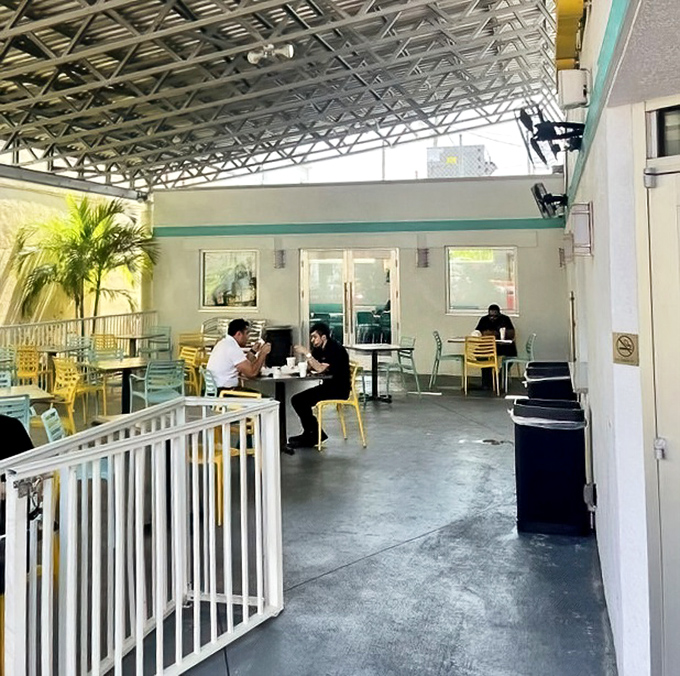 Outdoor seating where Florida sunshine is a free side dish, perfect for people-watching between bites of burger bliss.